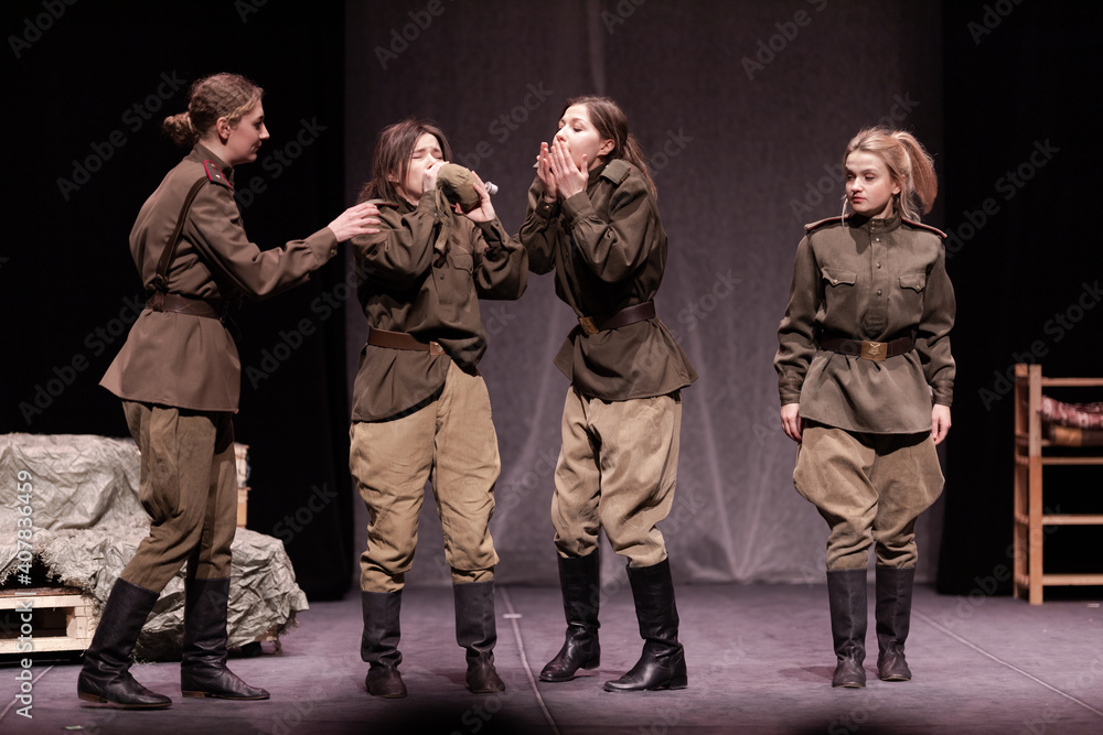 Actors in military uniforms of the Soviet army of World War II play a ...