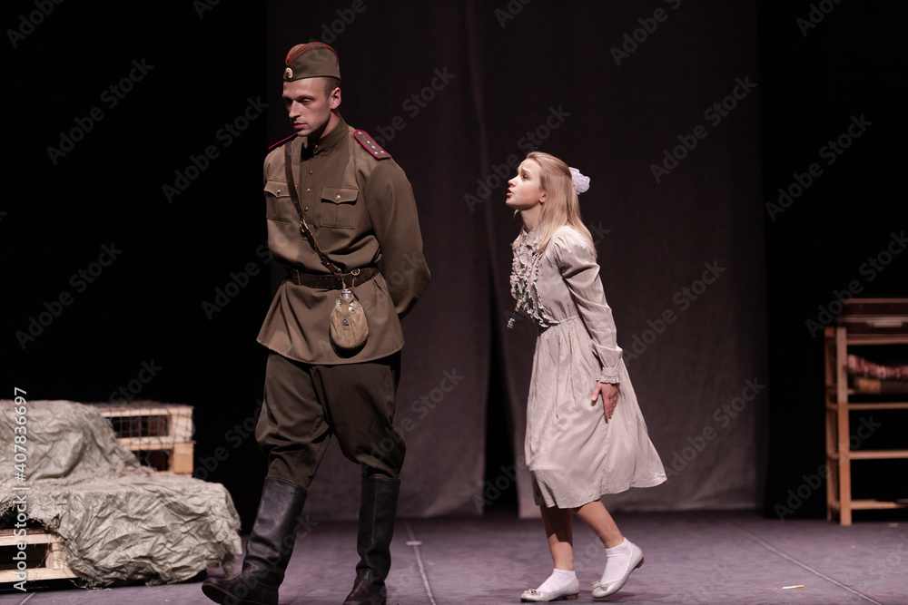 Actors in military uniforms of the Soviet army of World War II play a ...