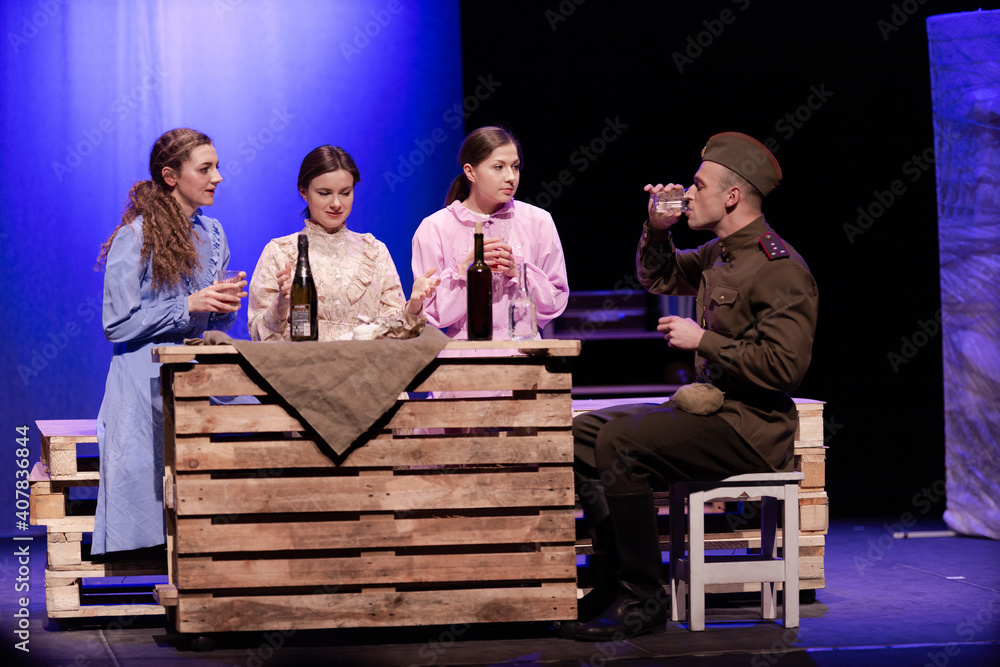 Actors in military uniforms of the Soviet army of World War II play a ...