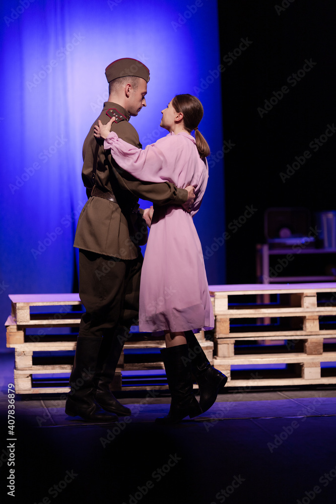 Actors in military uniforms of the Soviet army of World War II play a ...