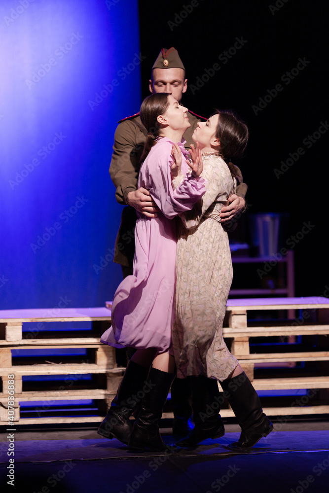 Actors in military uniforms of the Soviet army of World War II play a ...