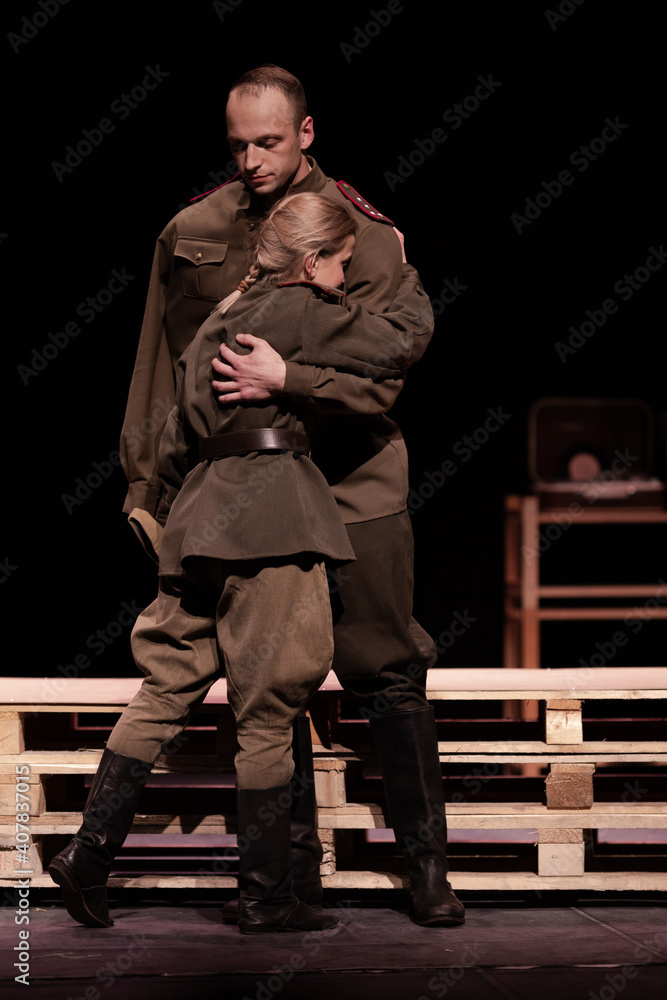 Actors in military uniforms of the Soviet army of World War II play a ...