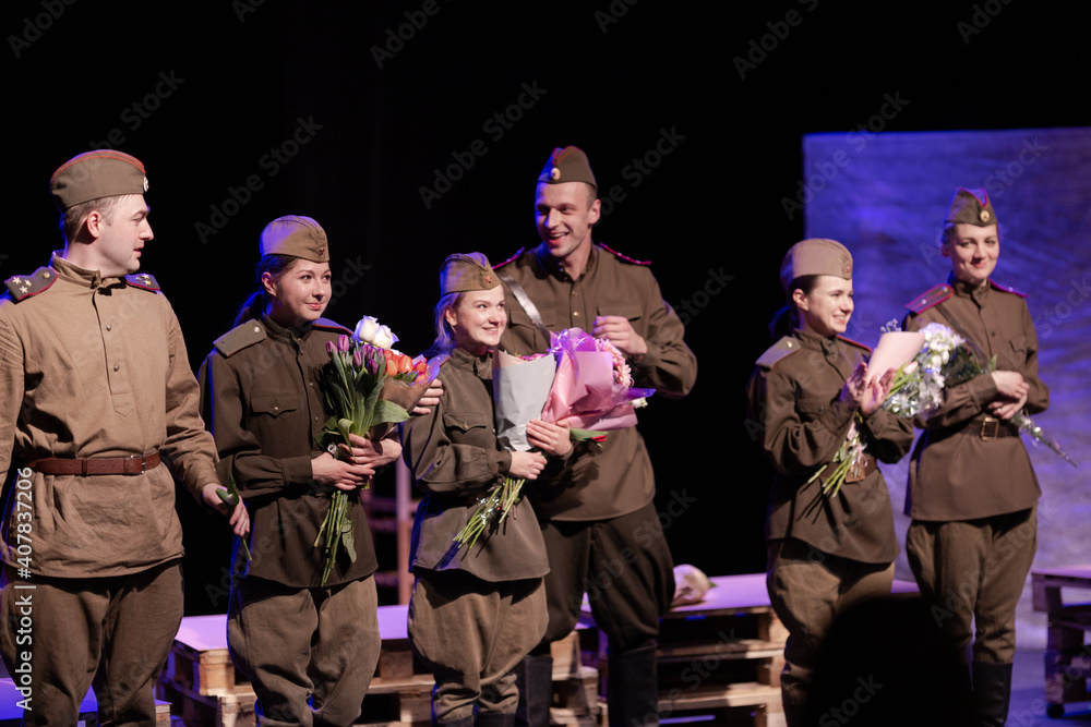 Actors in military uniforms of the Soviet army of World War II play a ...
