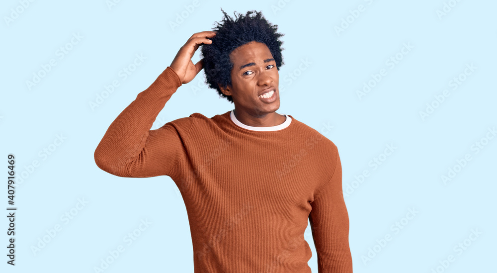 Handsome african american man with afro hair wearing casual clothes ...