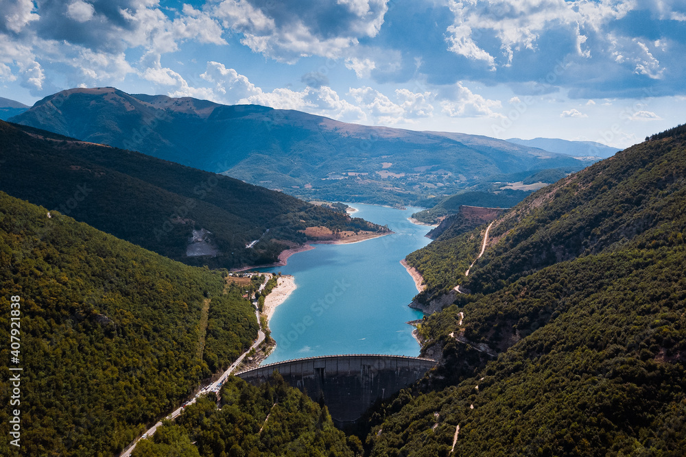 Italy - aerial view of Lake Fiastra with its dam in the Province of ...