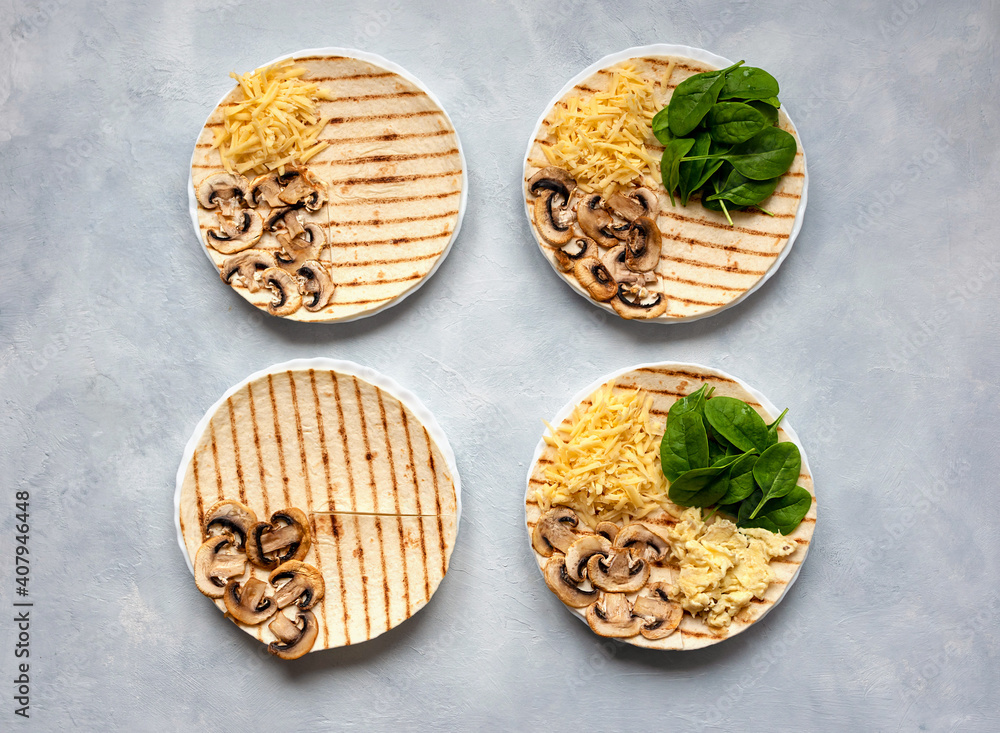 Tortillas with different fillings of mushrooms, cheese, spinach and ...
