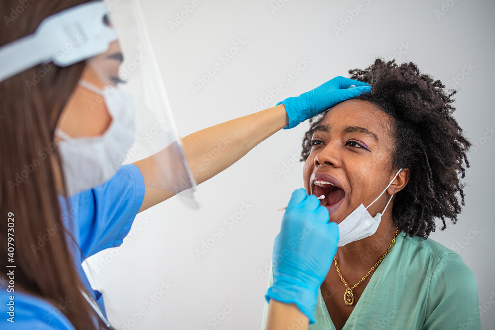 Professional medical worker wearing personal protective equipment ...