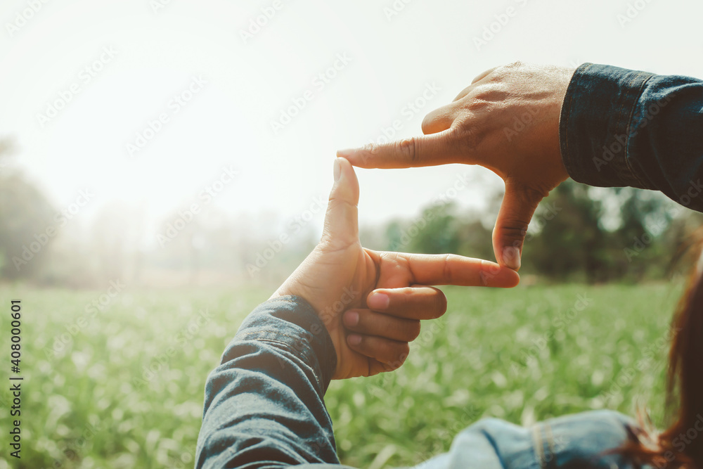 woman hand framing looking view sunrise Stock Photo | Adobe Stock