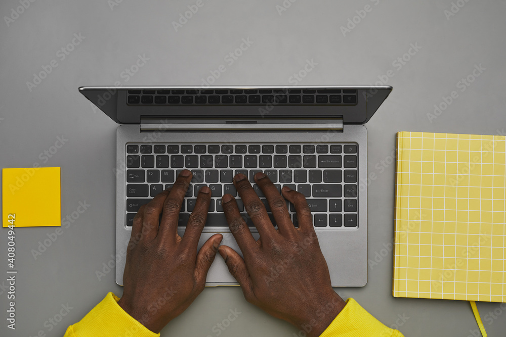 Graphic gray and yellow background of African-American male hands ...