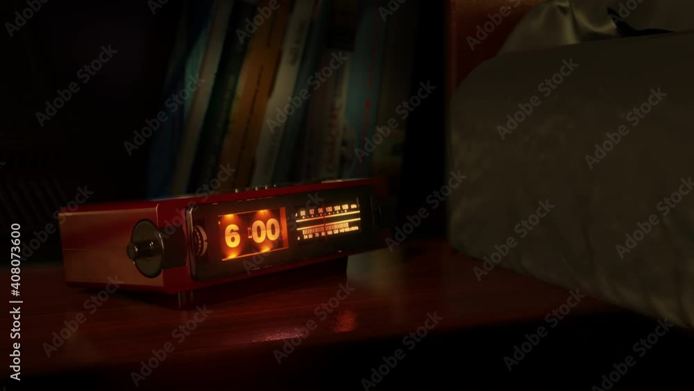 Vintage alarm clock with flip dial and radio wake up at 6 AM. Close-up ...