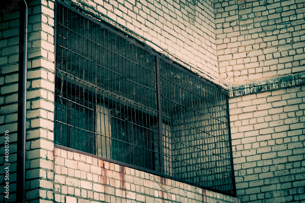 Gloomy background with brick wall surface texture with scary window ...