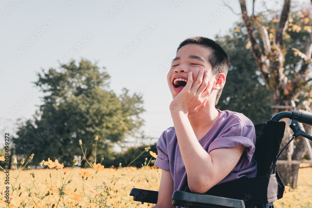 Disabled child on wheelchair is playing, learning and exercise in the ...