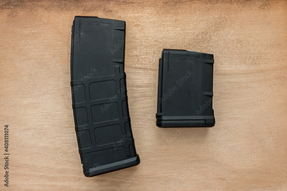 30 and 10 round bullet magazine for an AR-15 semi-auto assault rifle ...