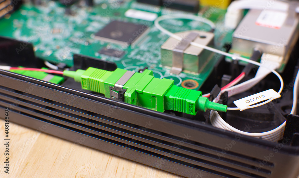 Fibre optic connector socket inside a wireless modem router Stock Photo ...