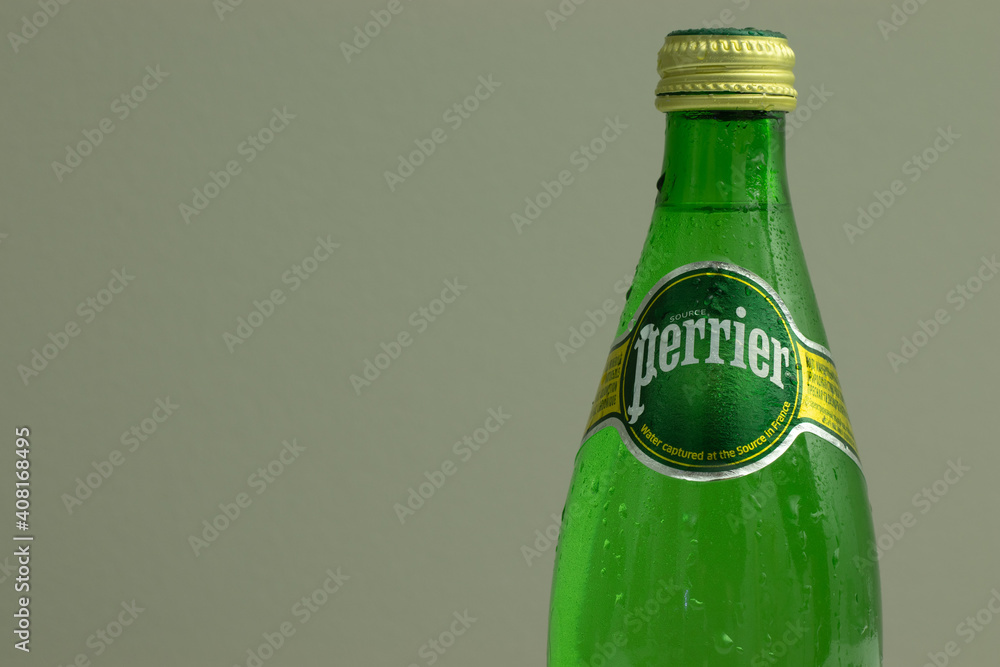 New York, USA - 1 January 2021: Perrier mineral water logo on bottle ...