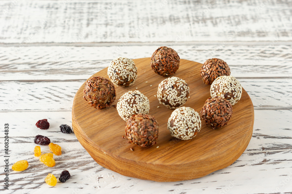 Healthy raw energy balls. Candy vegan balls of dates, coconut pulp ...