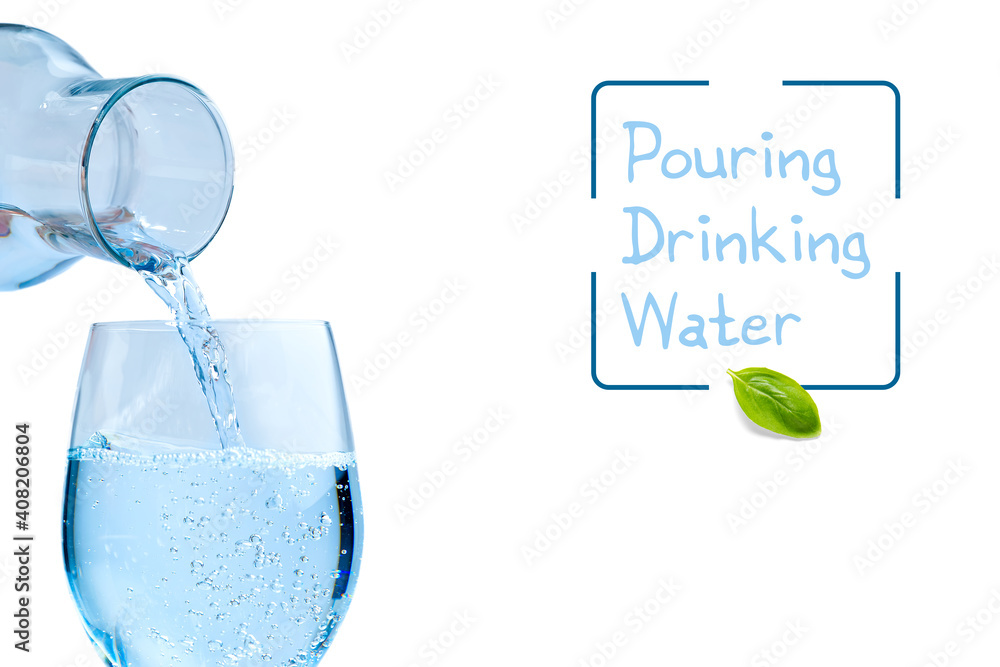 Pouring water. pouring drinking water from a glass decanter to glass ...