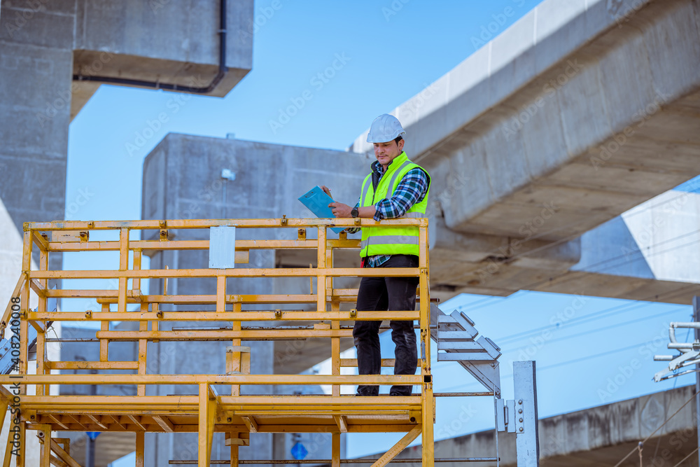 Portrait engineer under inspection and checking construction process ...