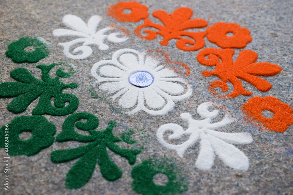 Tri color rangoli of Flower motif design drawn and coloured on the ...