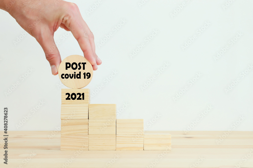 concept image of post pandemic idea, wooden cubes with text showing ...