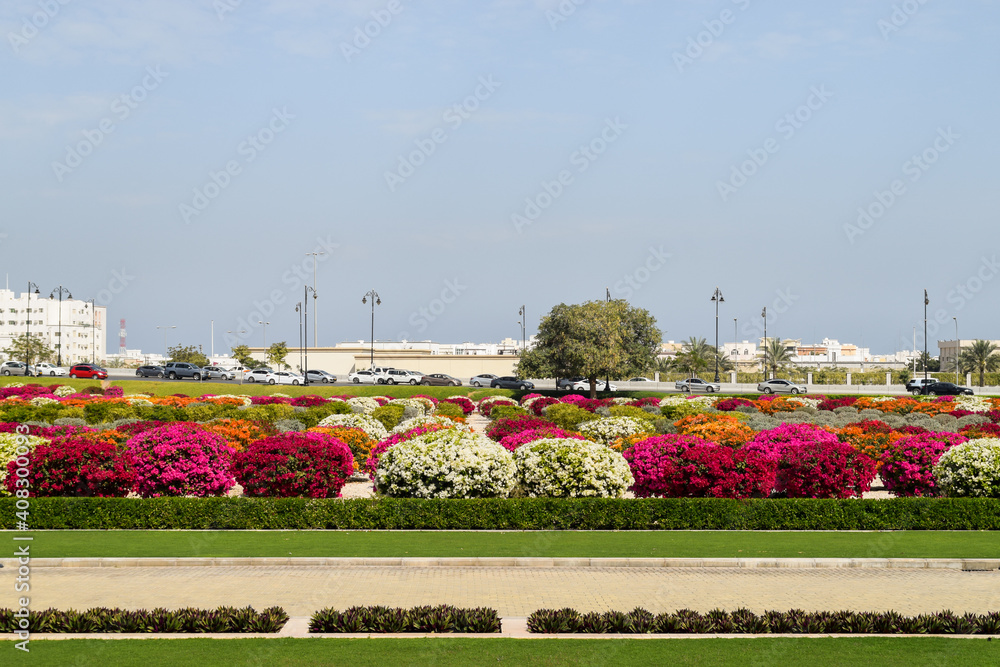 Colorful garden in front of Sultan Qaboos Grand Mosque. Muscat, Oman ...