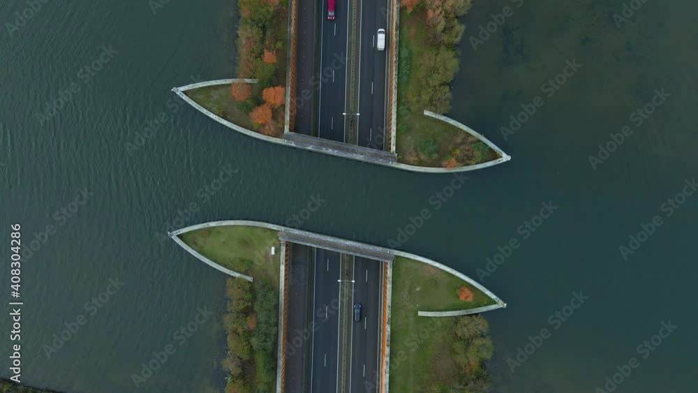 Aquaduct Veluwemeer optical illusion areal top down shot cars drive ...