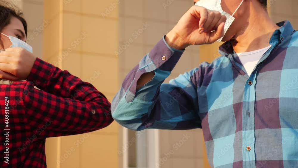dad and daughter touch elbows social distance. bump avoid greeting ...