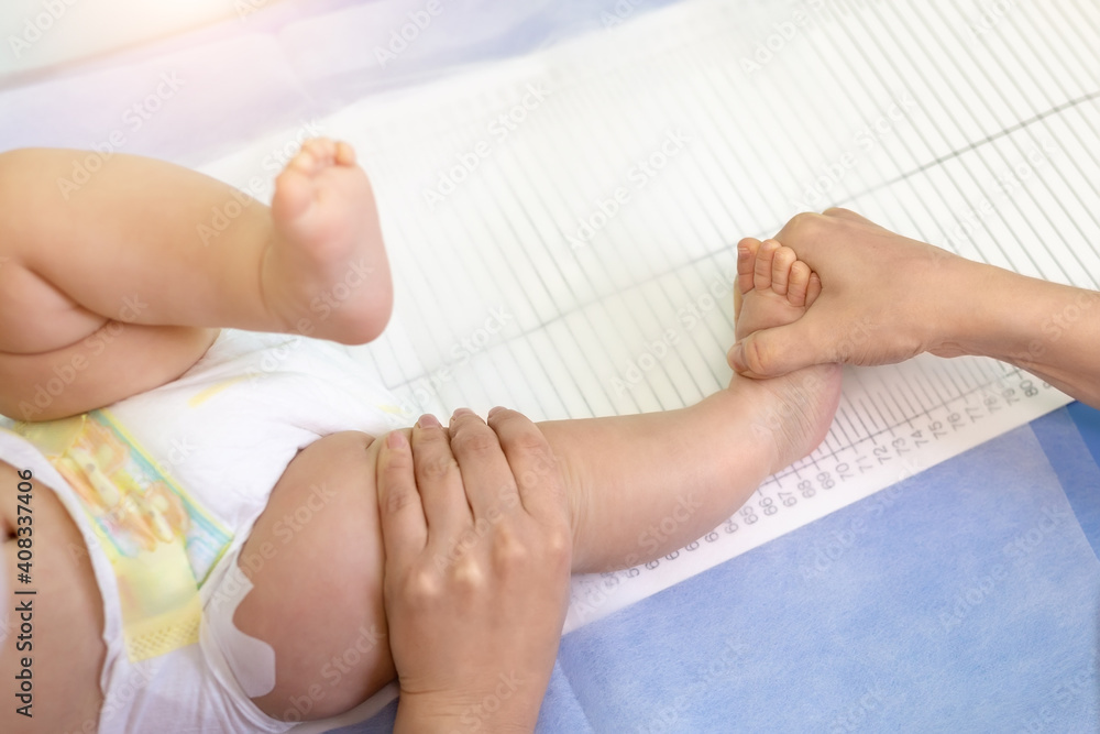 Pediatrician specialist taking measurement of infant child height ...