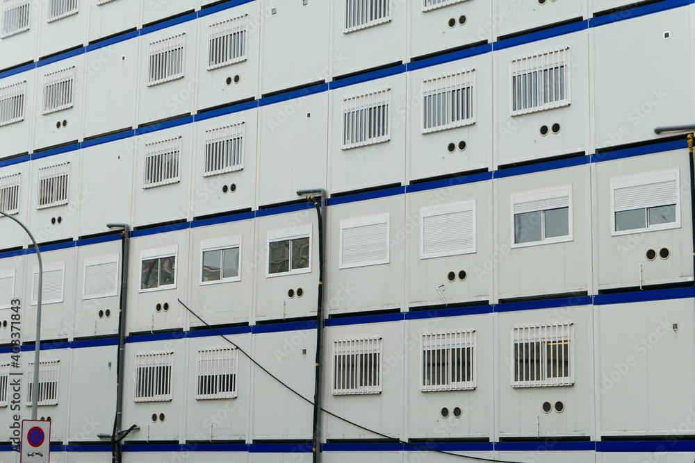 Prefabricated modular offices. Stacking of boxes for construction site ...