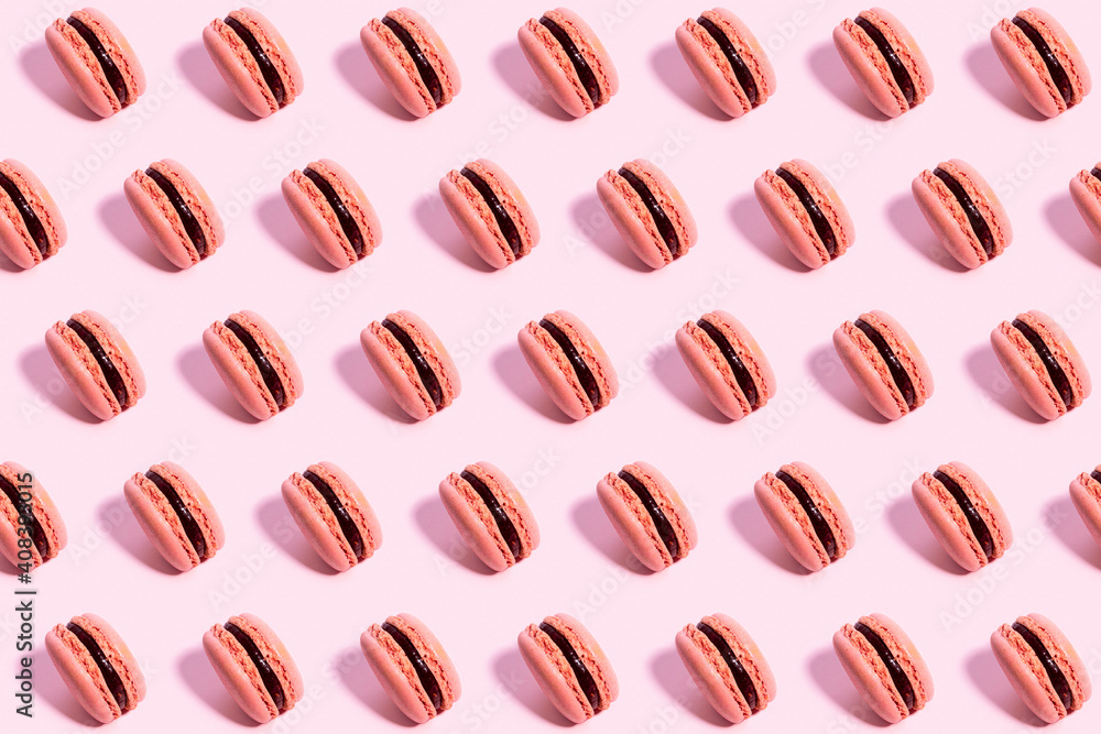 Pattern of pink macaroon cookies against pink background Stock Photo ...