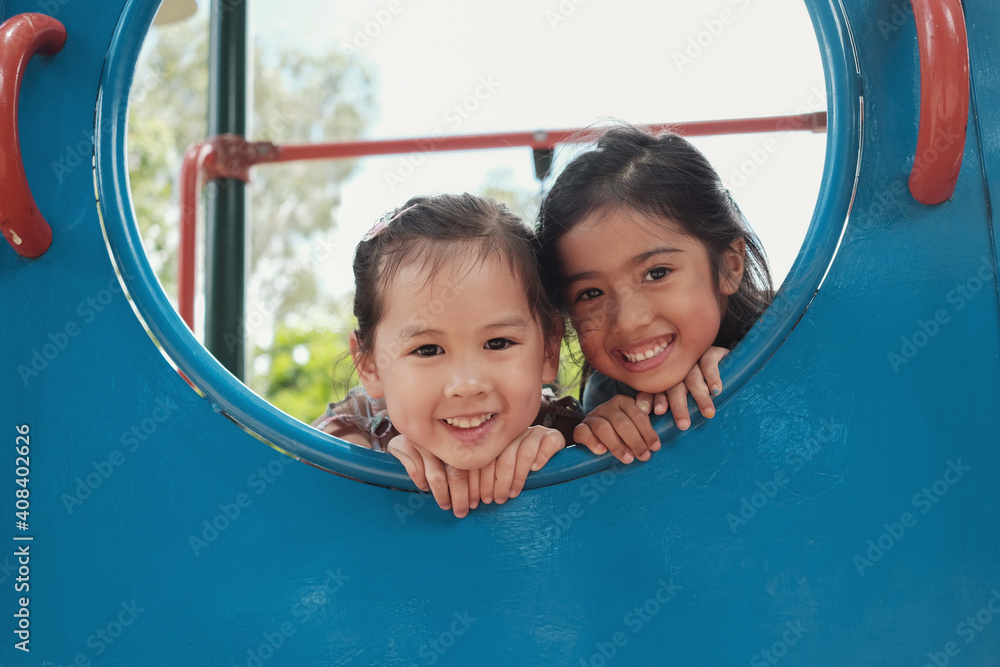 multicultural kids having fun at playground Stock Photo | Adobe Stock