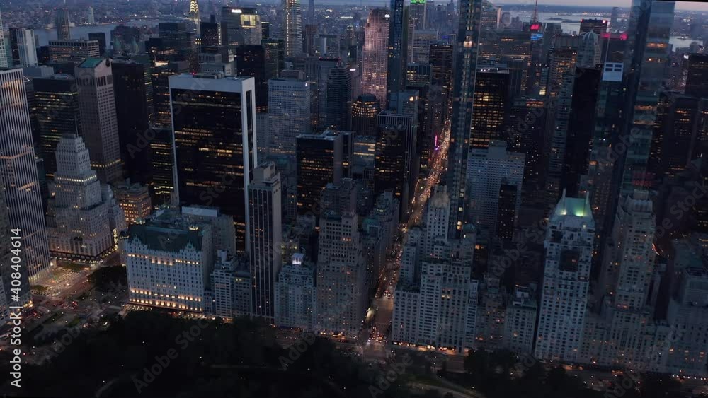 Establishing Shot over Big City Skyline at Night with countless ...
