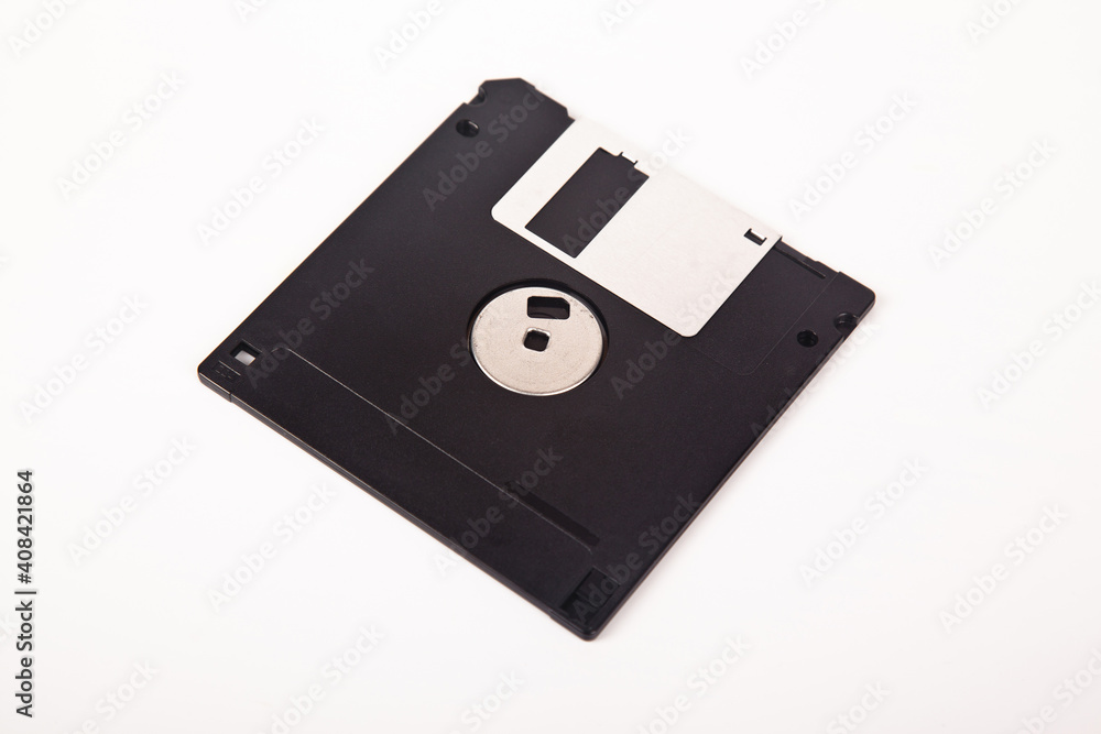 Old computer and data storage technology, black magnetic floppy disk 3½ ...
