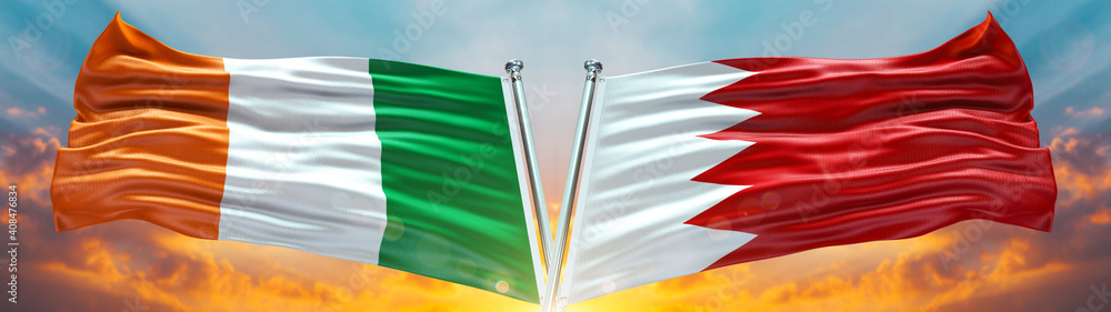 Bahrain Flag and Ireland flag waving with texture sky Cloud and sunset ...