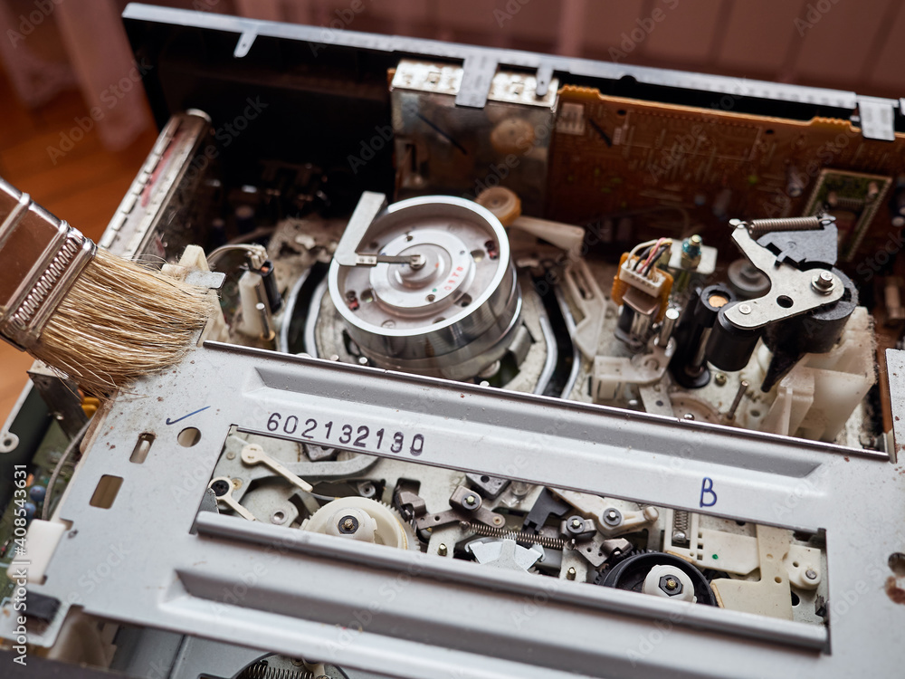 Cleaning and repair of the tape of the extended mechanism of VHS player ...