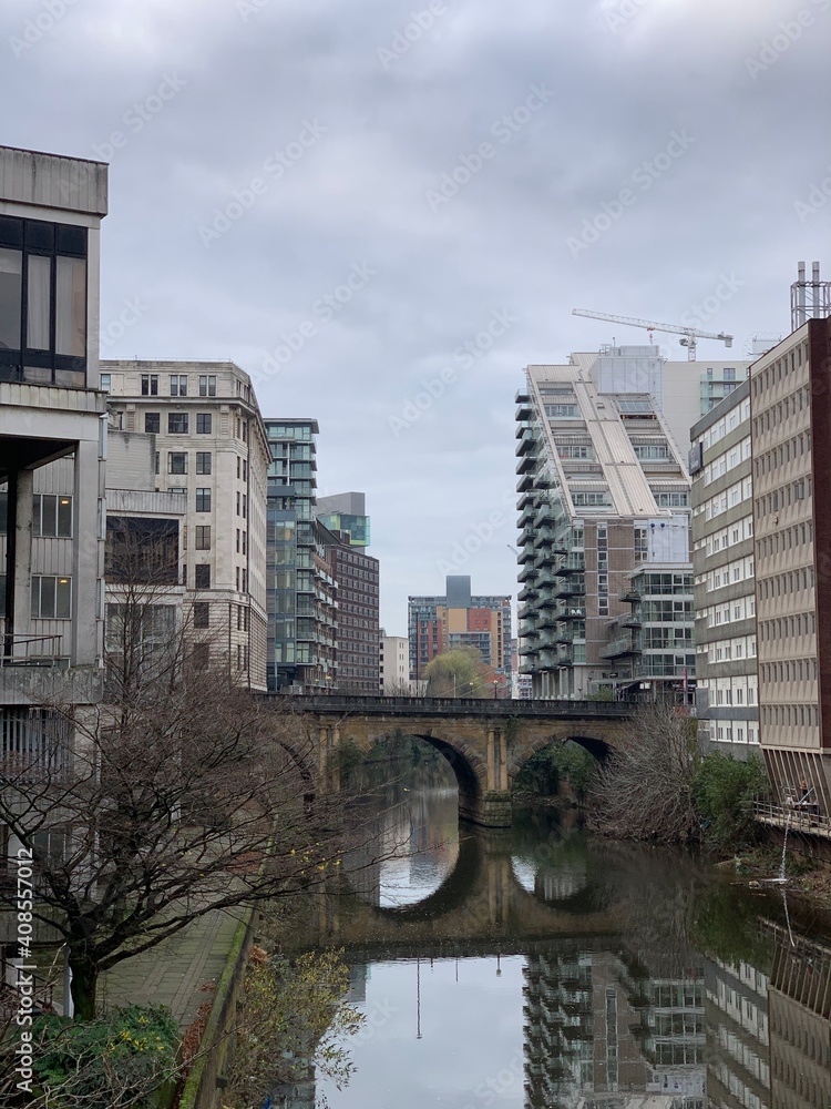 Architecture in Manchester City centre with modern glass buildings and ...