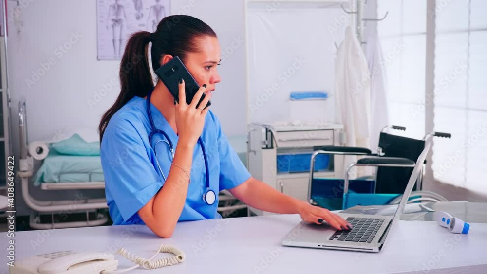 Video „Medical nurse talking on mobile with doctor about list of ...