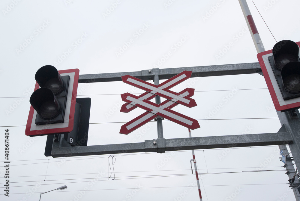 ungated railroad crossing with level crossing sign Stock Photo | Adobe ...