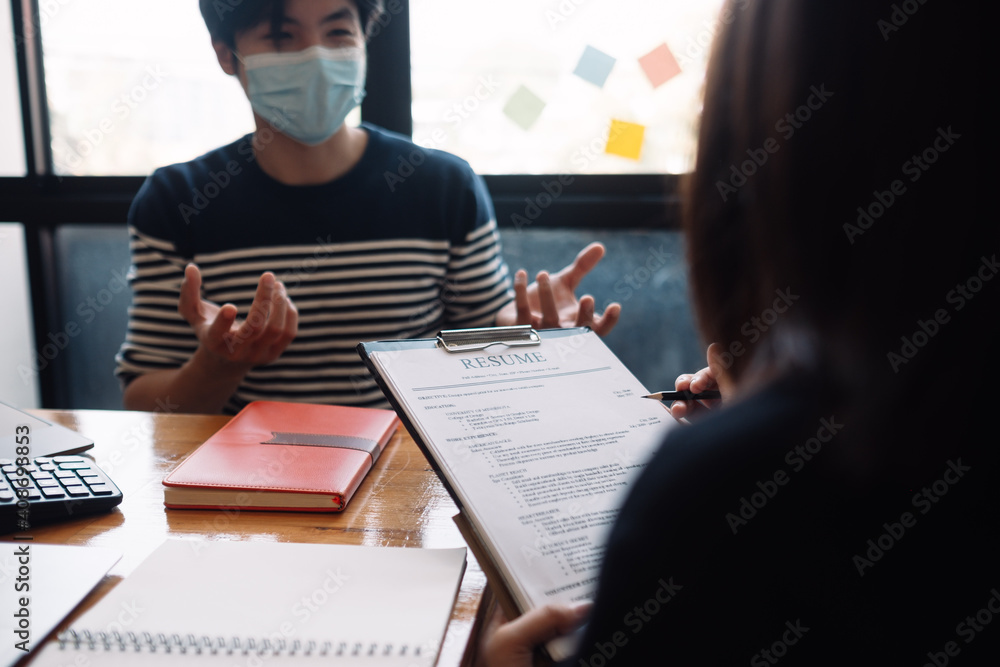 businesswoman manager and man wearing protection face during job ...