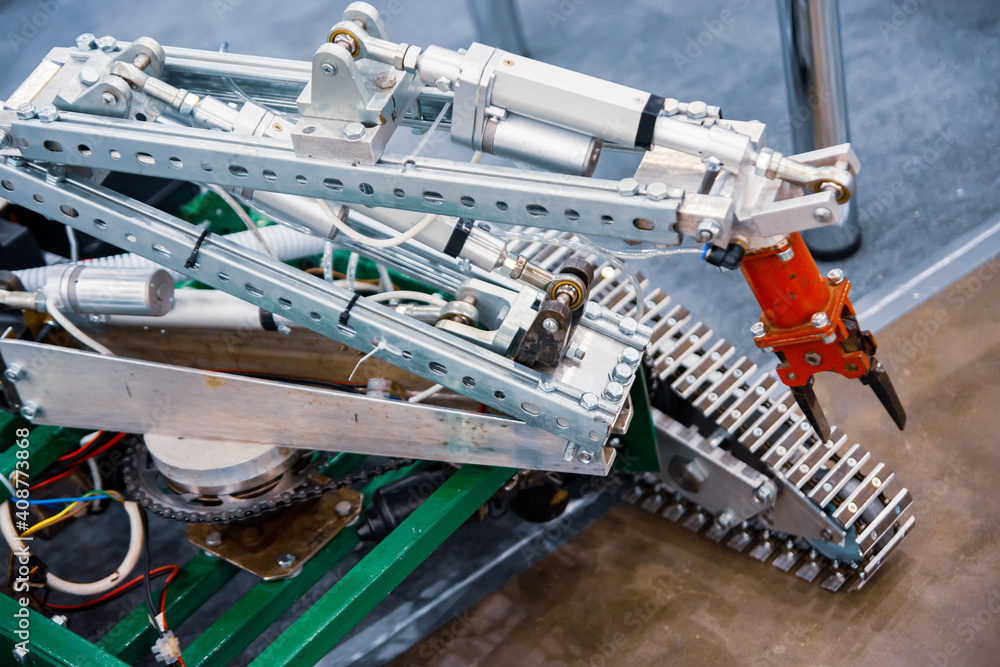 Mobile crawler robot with arm manipulator Stock Photo | Adobe Stock