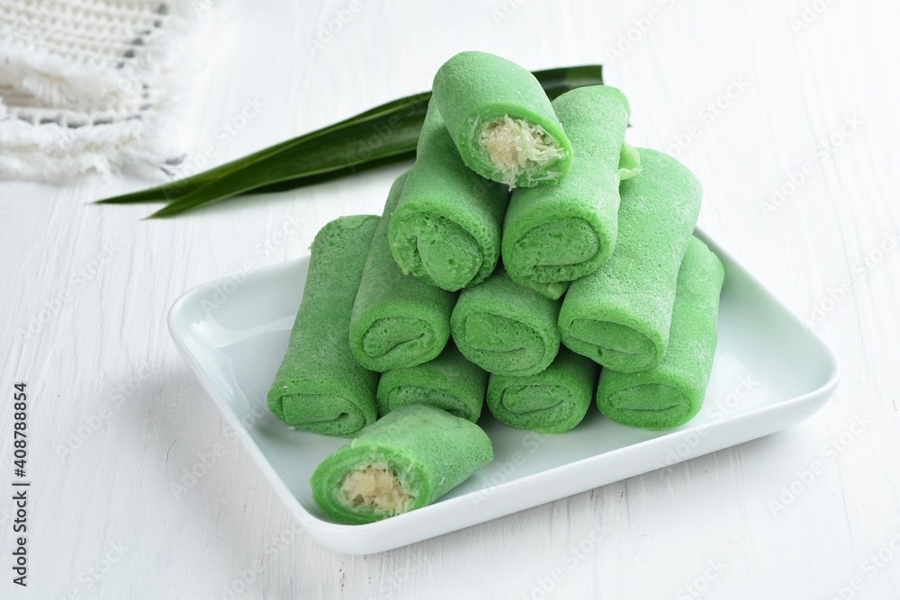 dadar gulung or ketayap is an traditional sweet snack ,popular in ...