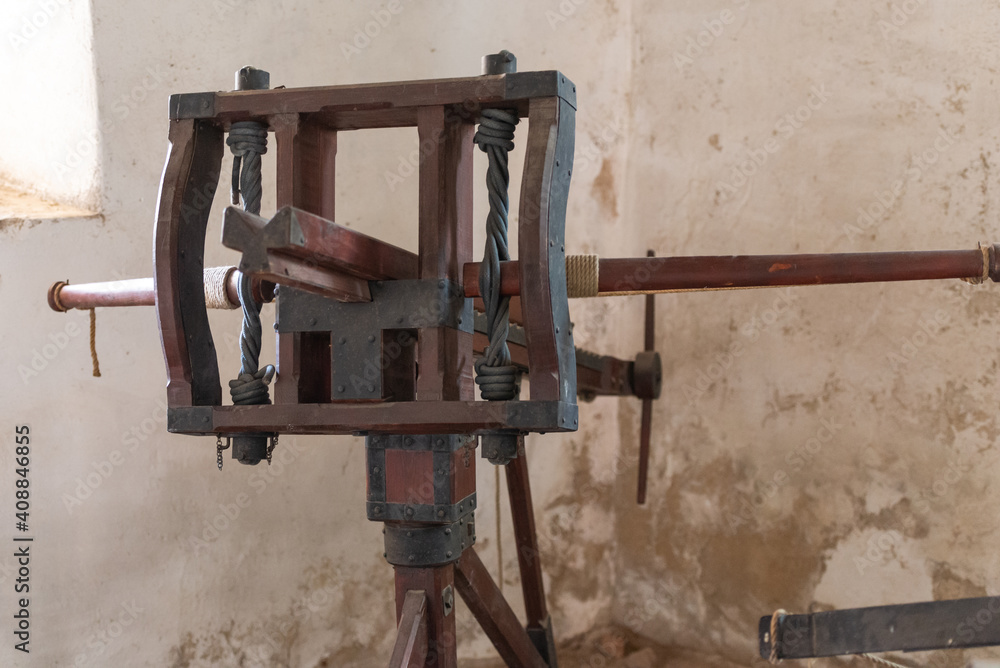 Scorpion Throwing Catapult. An old siege catapult stands in an old ...