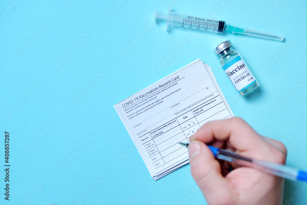 Doctor s Hand Filling Out Vaccination Passport Immune Passport Or doctor-s-hand-filling-out-vaccination-passport-immune-passport-or