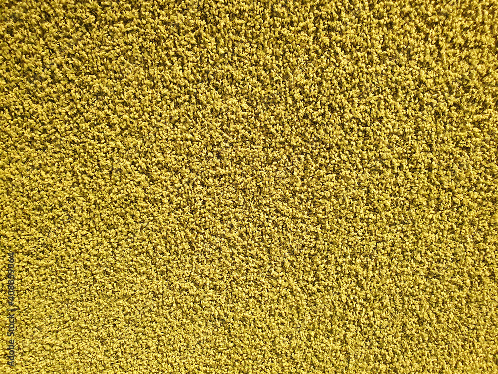 Yellow carpet roll covering. Polypropylene long pile carpet texture ...