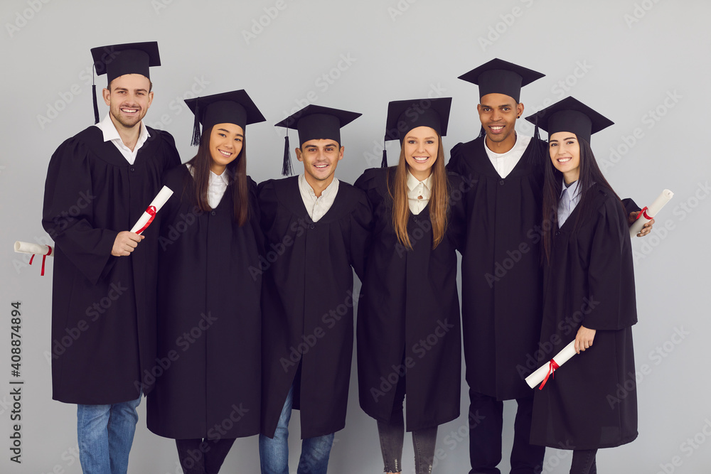 Group portrait of happy multicultural university or college graduates ...
