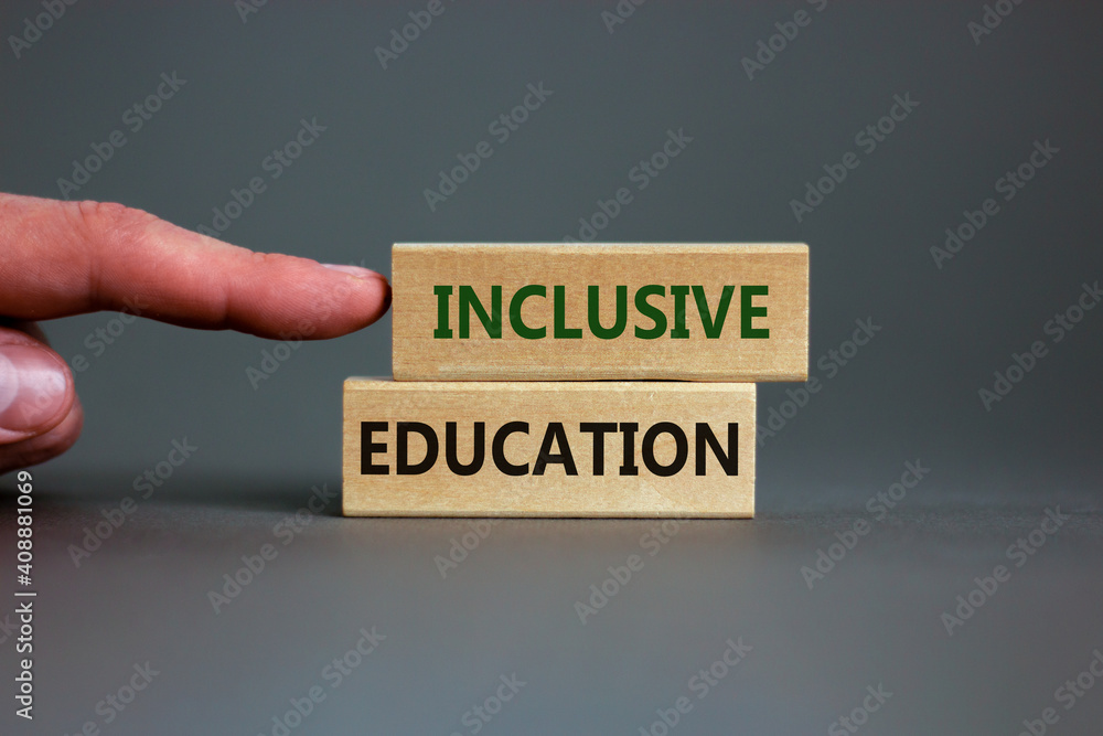 Inclusive education symbol. Wooden blocks form the words 'inclusive ...