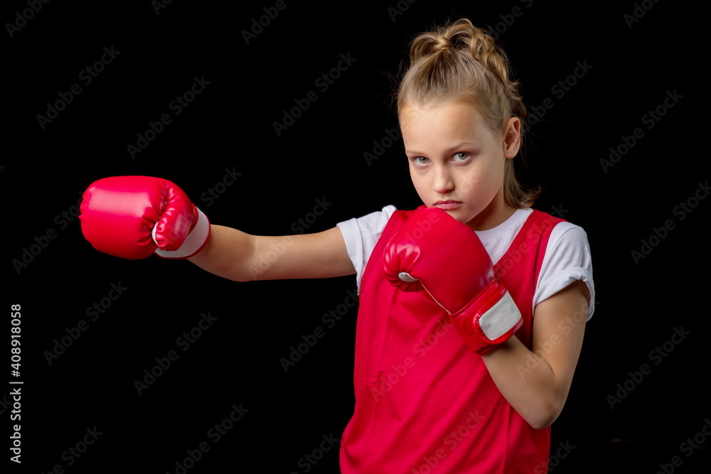 Sporty teenage girl doing boxing exercises Stock Photo | Adobe Stock