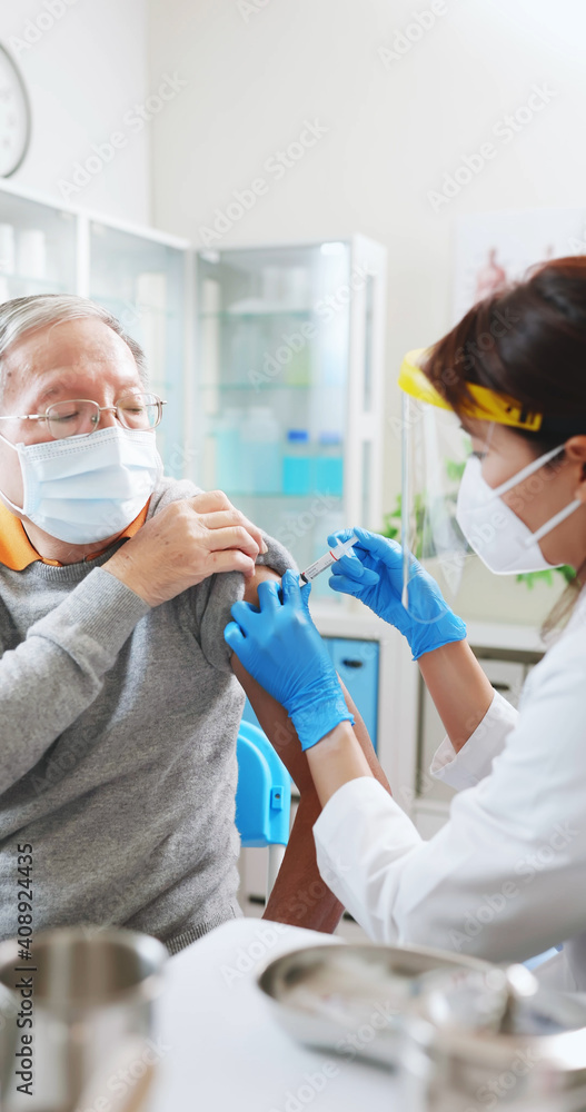 doctor making COVID19 vaccination Stock Photo | Adobe Stock