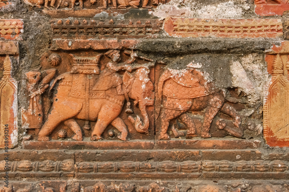 Carved terracotta scene of war elephants on beautiful ancient Chauchala ...