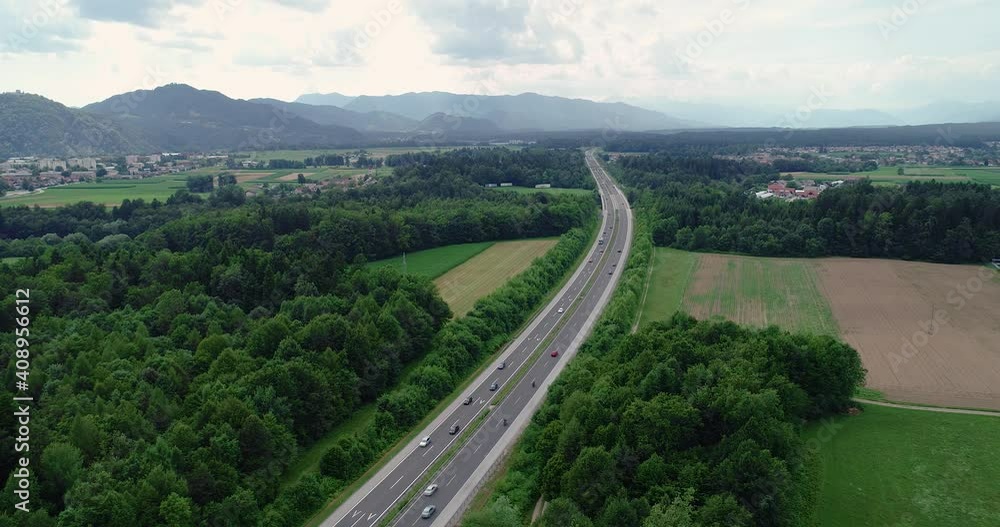 Elevated view of traffic on highway in Slovenia. High flying drone over ...